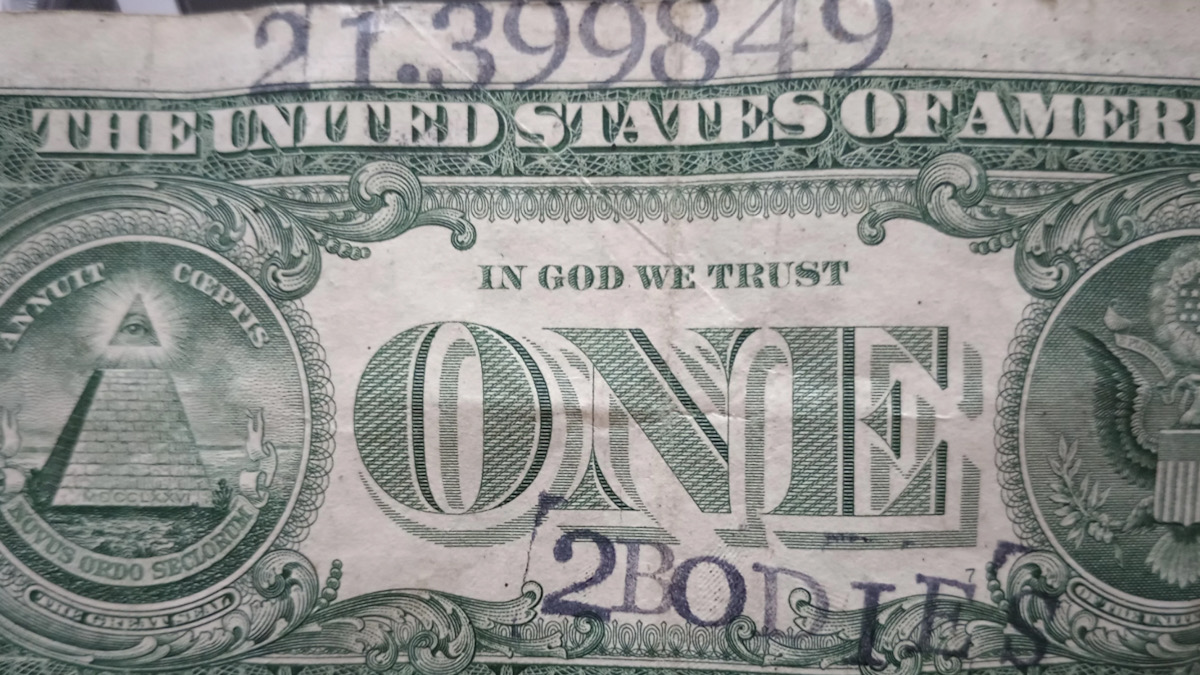 A Dollar Bill Sparks a Potential Murder Mystery