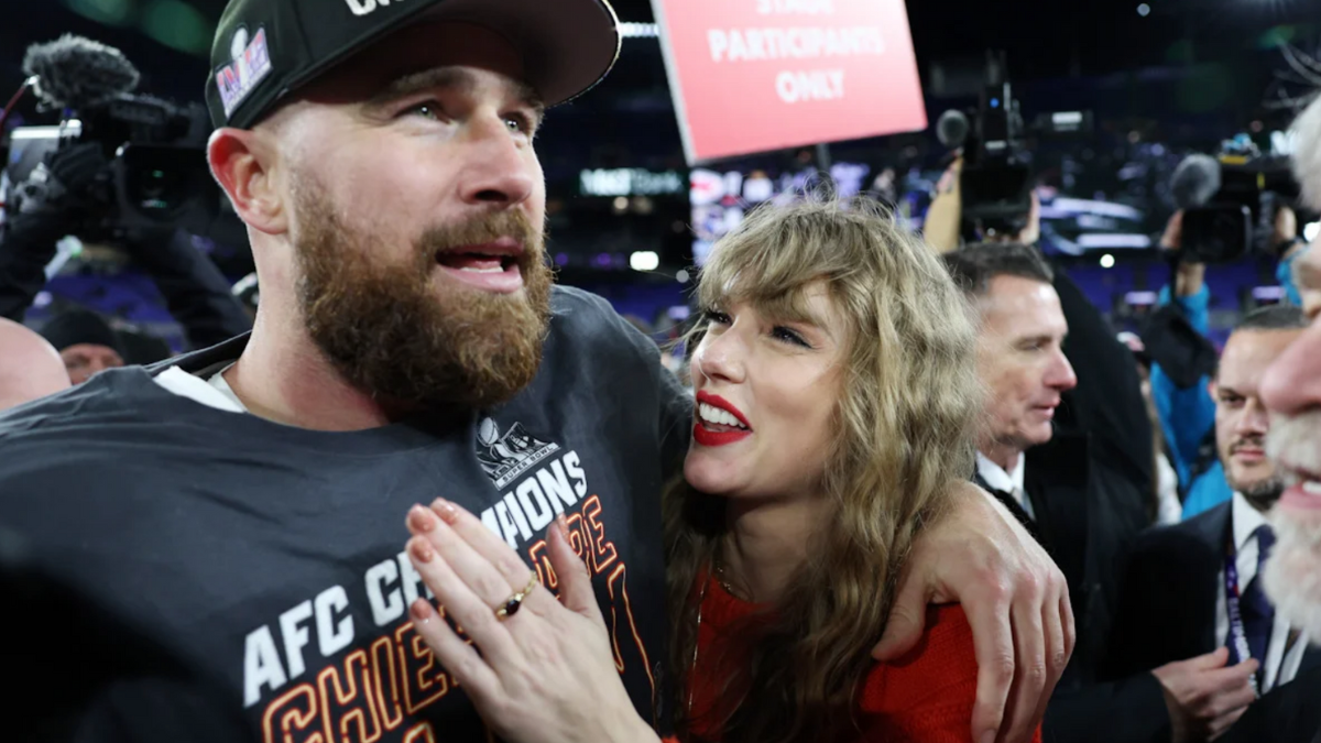 Travis Kelce Carrying Taylor Swift, Explained
